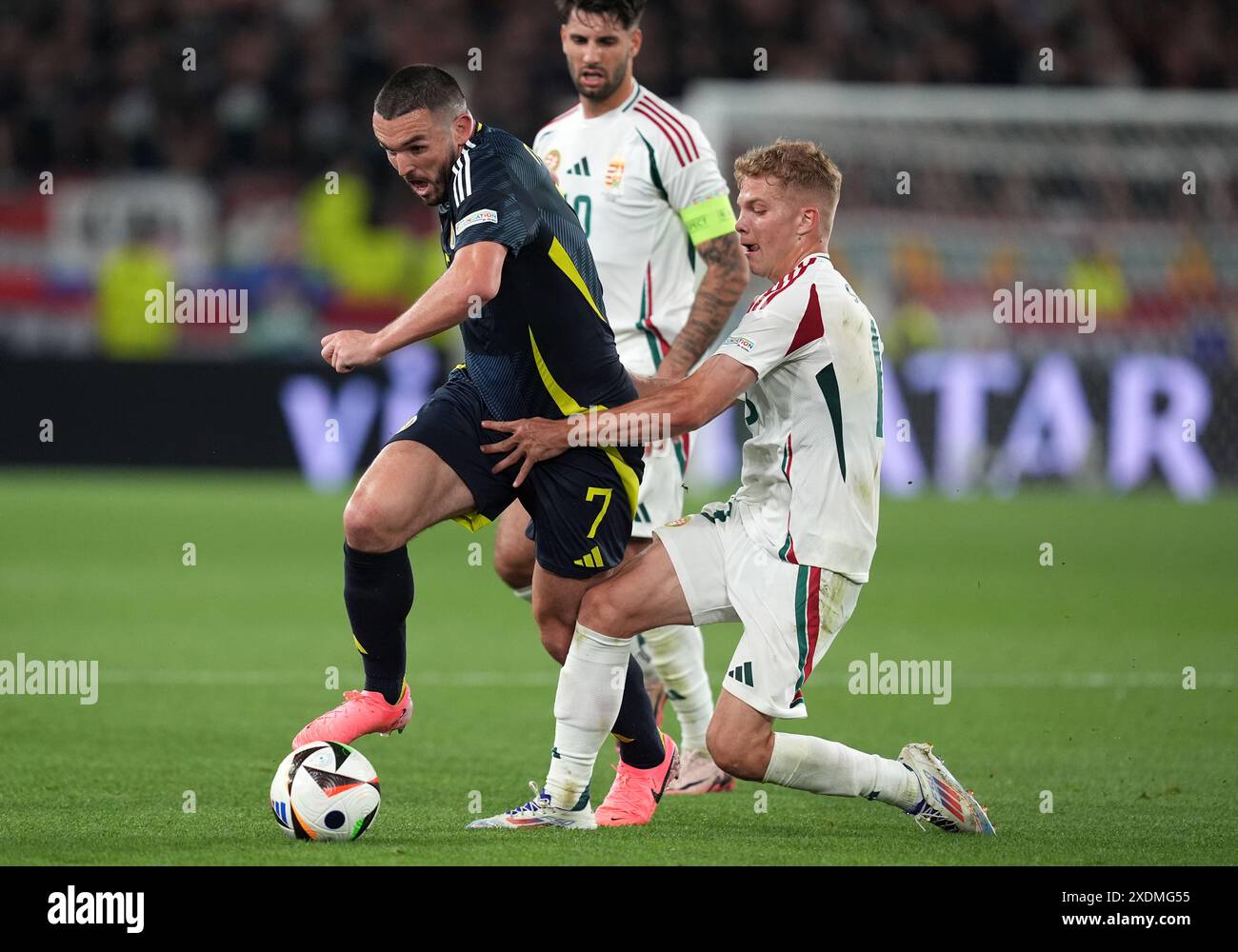 Scotland's John McGinn (left) and Hungary's Andras Schafer battle for ...
