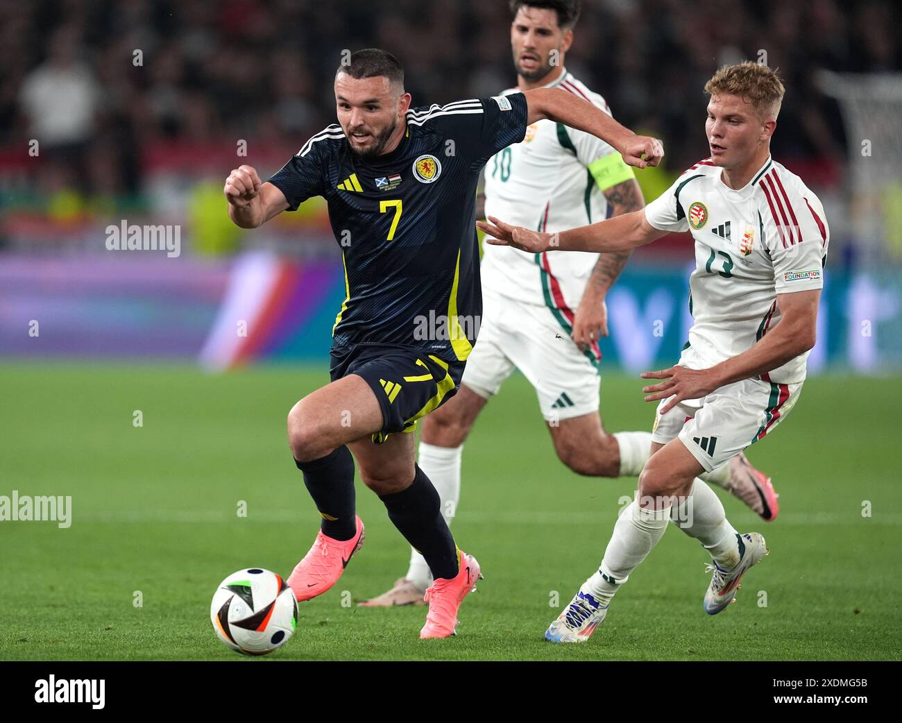 Scotland's John McGinn (left) and Hungary's Andras Schafer battle for ...
