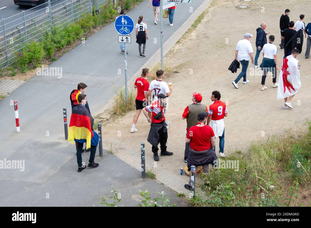 Football fans, spectators, supporters in colorful Germany and ...