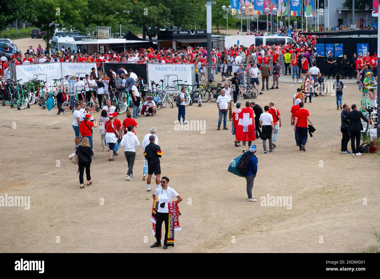 Football fans, spectators, supporters in colorful Germany and ...