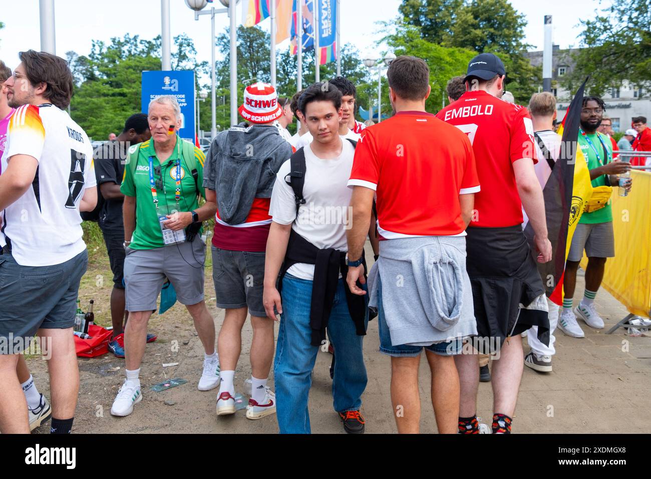 Football fans, spectators, supporters in colorful Germany and ...
