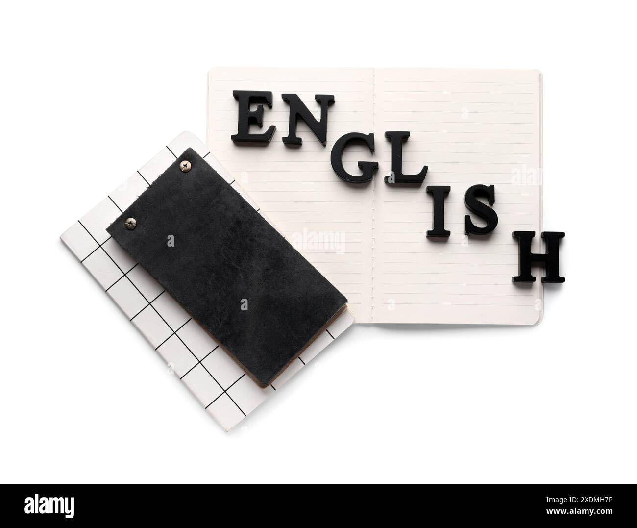 Notebooks and word ENGLISH isolated on white background Stock Photo - Alamy