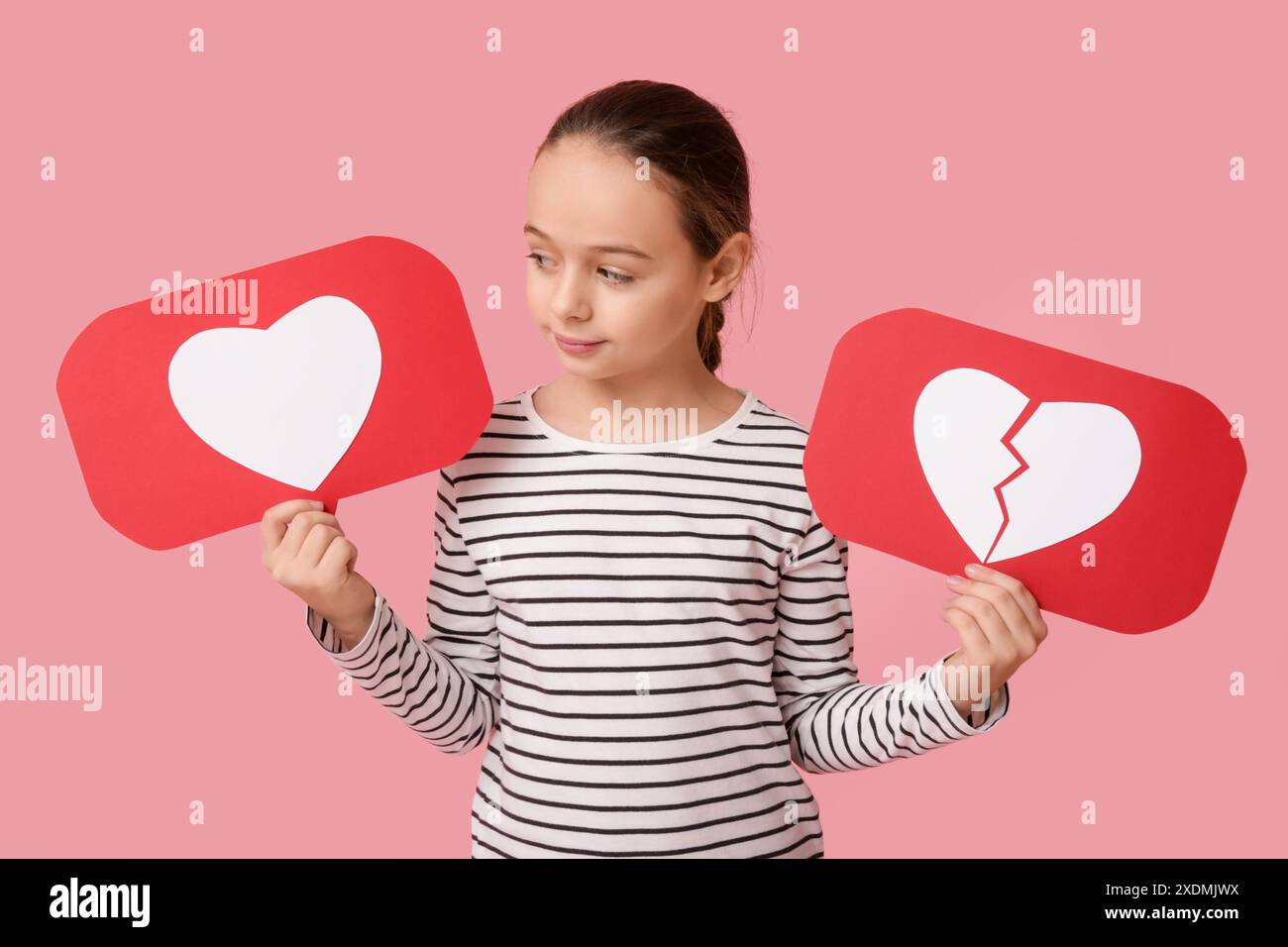 Little girl with heart like and dislike icons on pink background Stock ...
