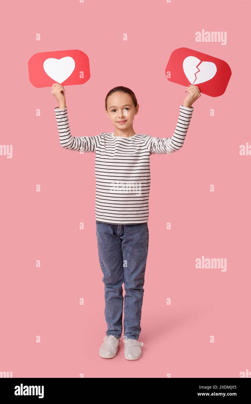 Little girl with heart like and dislike icons on pink background Stock ...