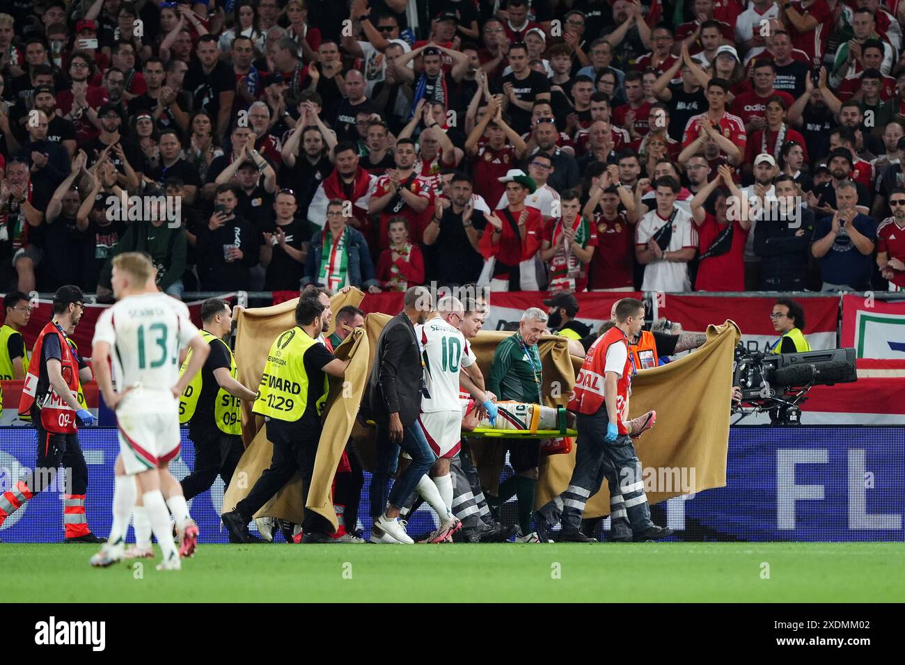 Hungary's Barnabas Varga leaves the pitch on a stretcher following a ...
