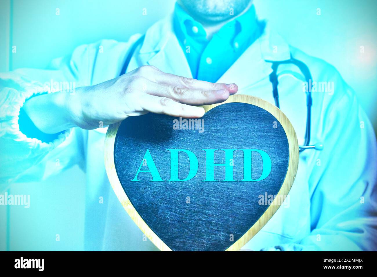 Doctor Psychiatric holding a blackboard with the text "ADHD" concept of ...