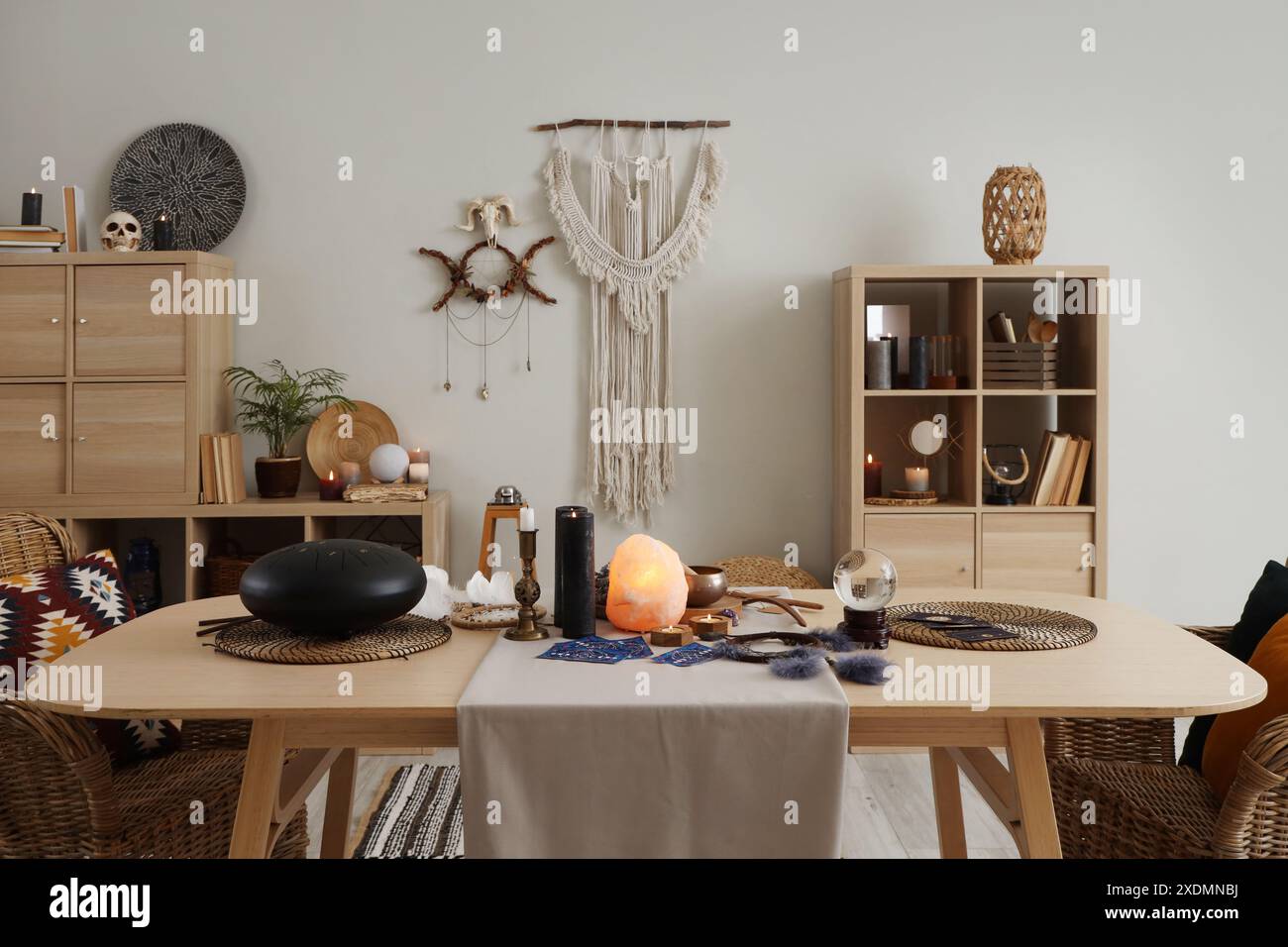 Interior of witch's room with magic attributes, table and shelf unit ...
