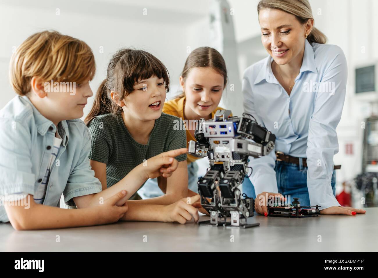 Children learning robotics in Elementary school. Young students ...