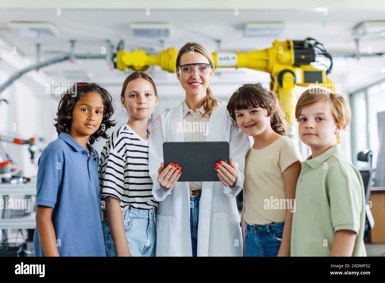Portrait of children learning robotics in Elementary school, standing ...