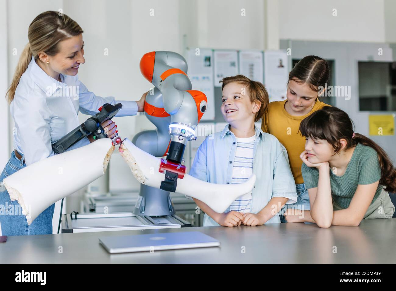 Children learning robotics in Elementary school. Young students going ...