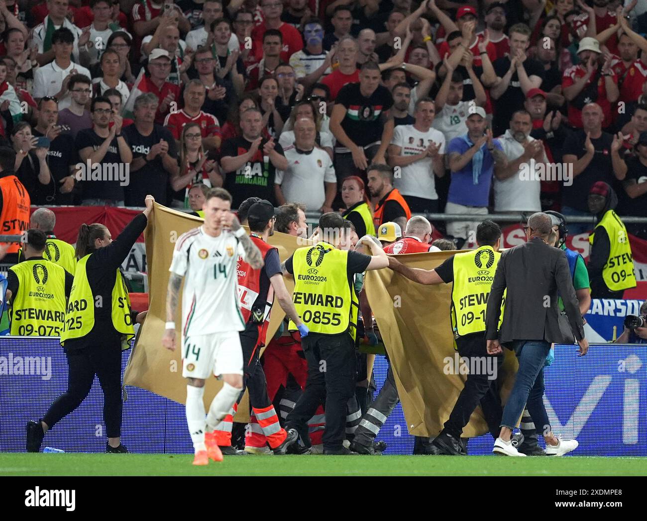 Hungary's Barnabas Varga lifted off the pitch by stretcher after a ...