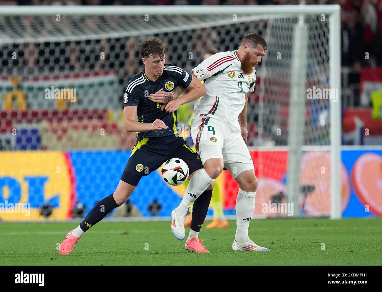 Scotland's Jack Hendry and Hungary's Martin Adam battle for the ball ...
