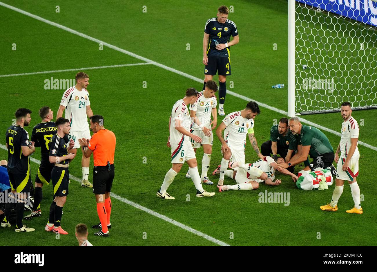 Hungary's Barnabas Varga is assisted by the medical team after ...