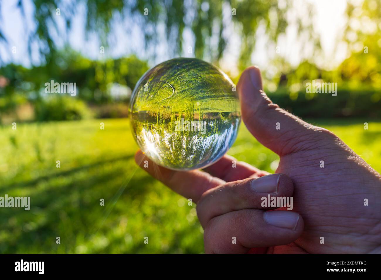 Golden sunlight on glass ball hi-res stock photography and images - Alamy