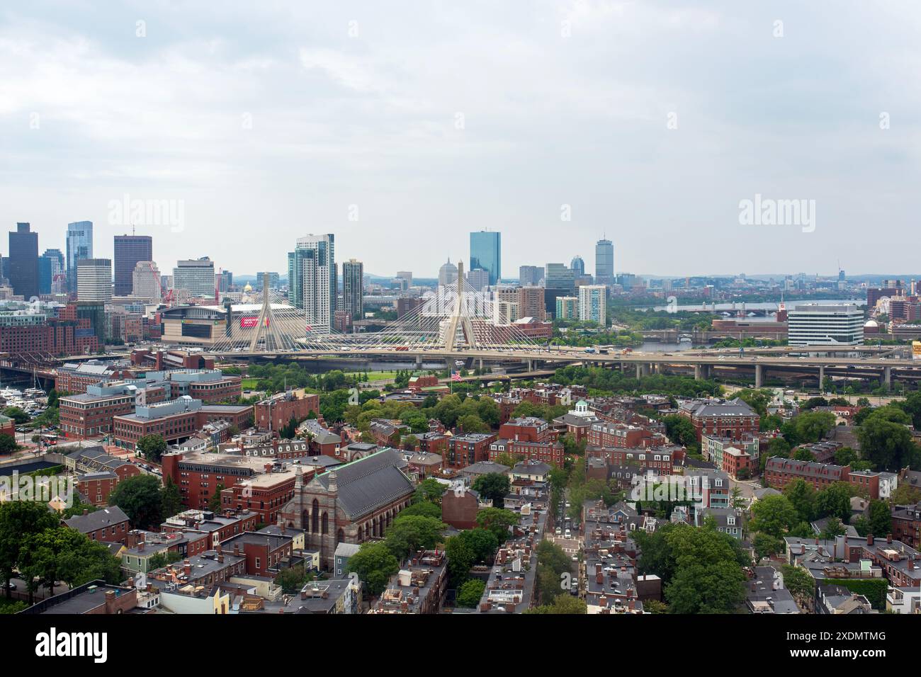 Boston Massachusetts Skyline on an overcast day with the Zakim Bridge ...