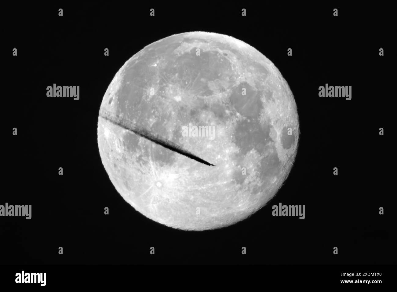 Airplane in front of moon Black and White Stock Photos & Images - Alamy