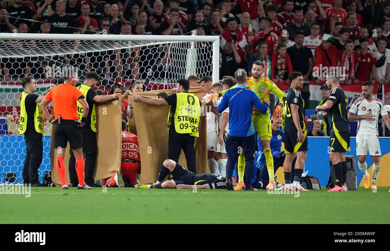 Hungary's Barnabas Varga receives treatment following a collision ...