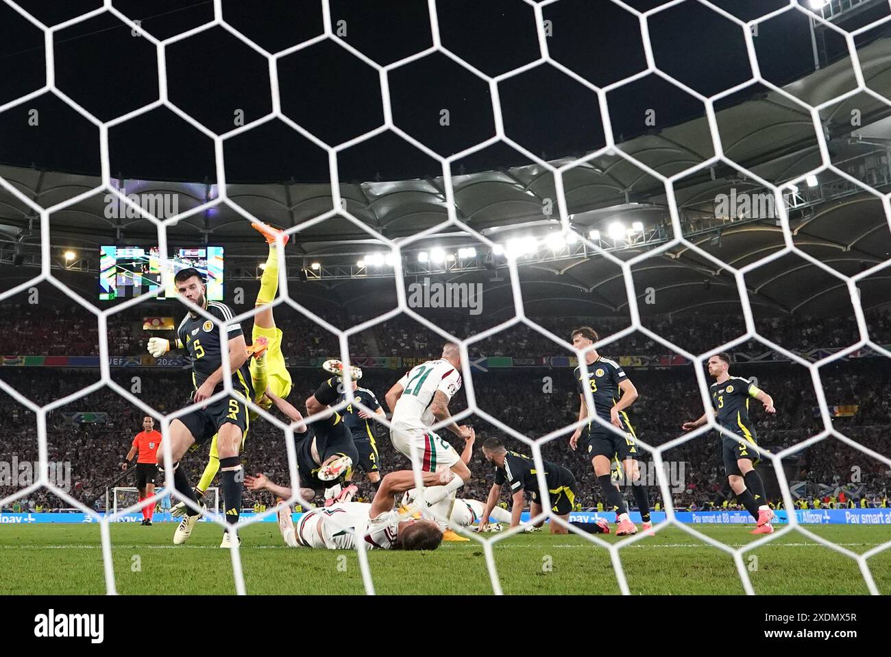 A collision between Scotland goalkeeper Angus Gunn and Hungary's ...