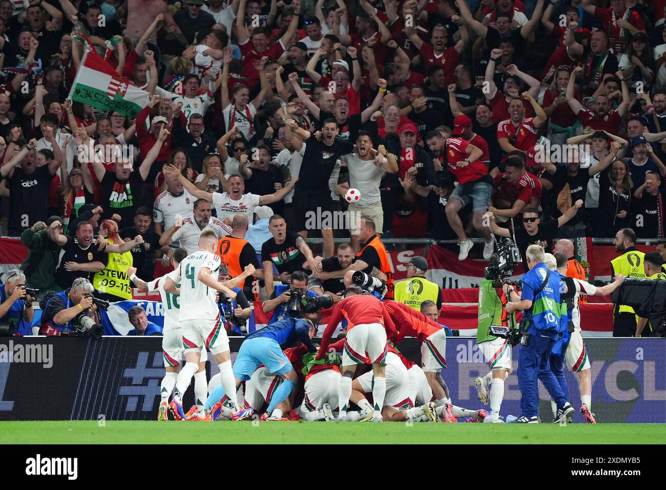 Hungary's Kevin Csoboth celebrates with team-mates after scoring their ...
