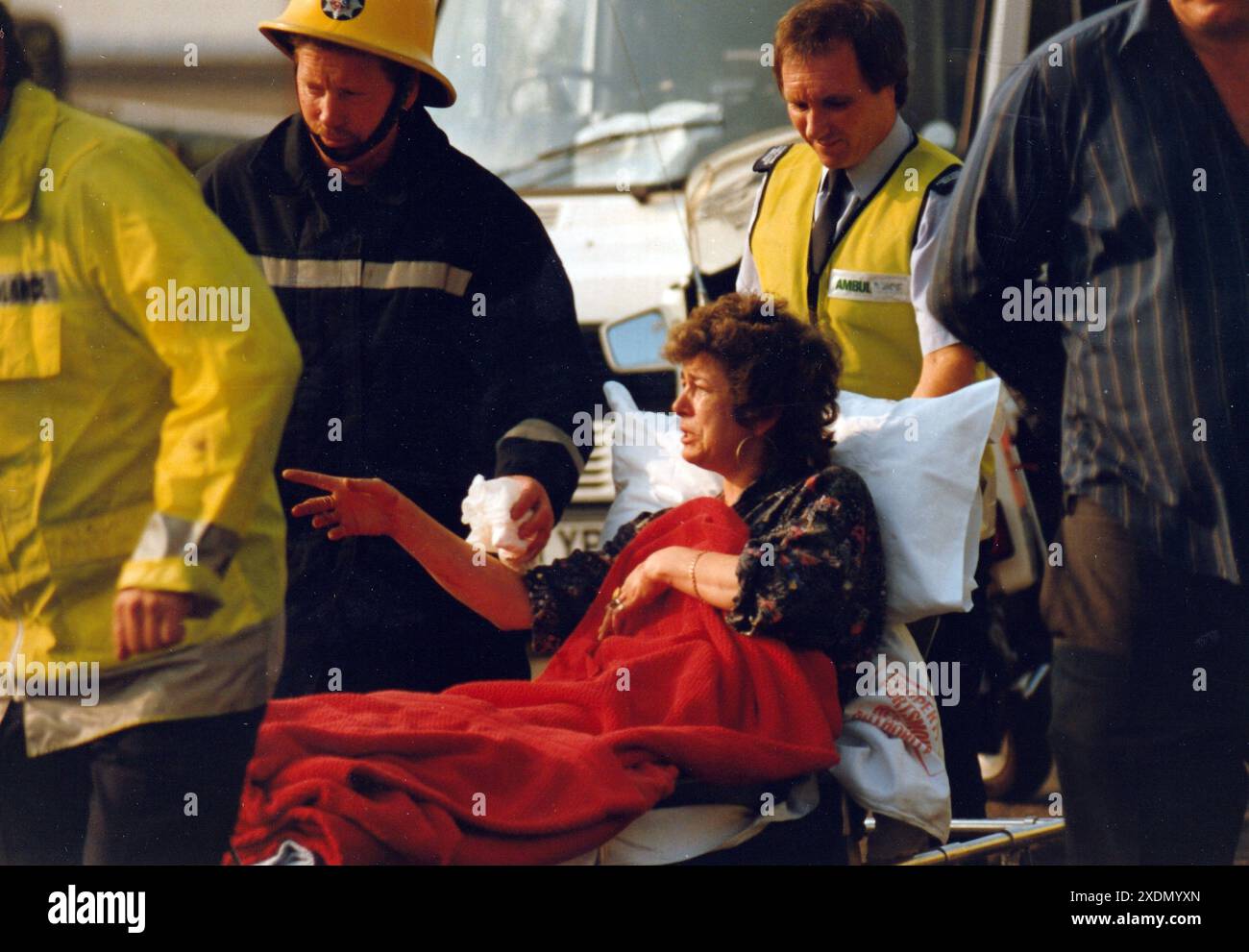 POLICE AND AMBULANCEMEN HELP VICTIMS OF THE ROAD TRAFFIC ACCIDENT ON ...