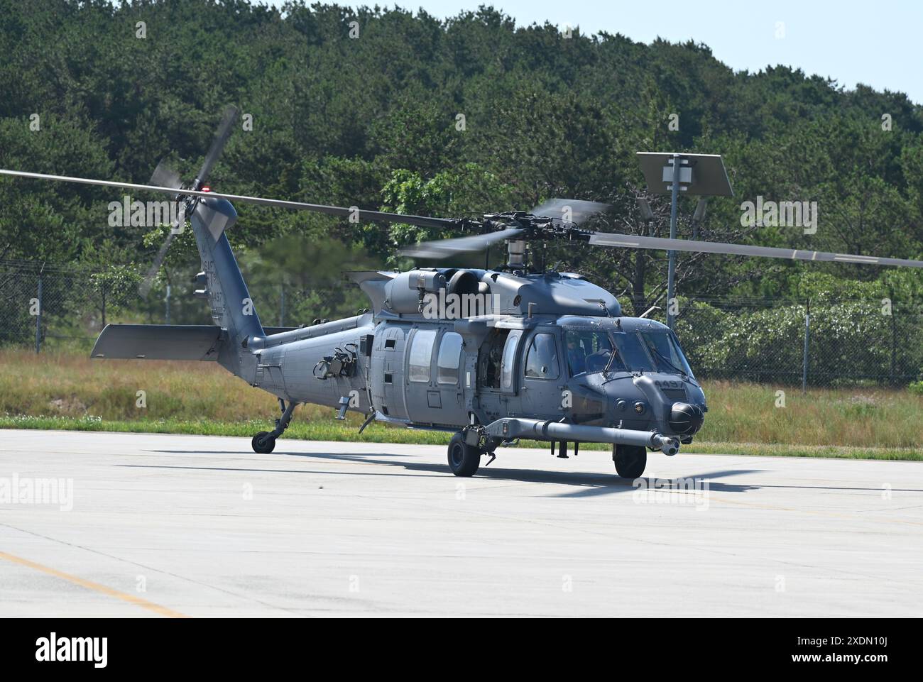 An HH-60W Jolly Green II combat search and rescue helicopter assigned ...