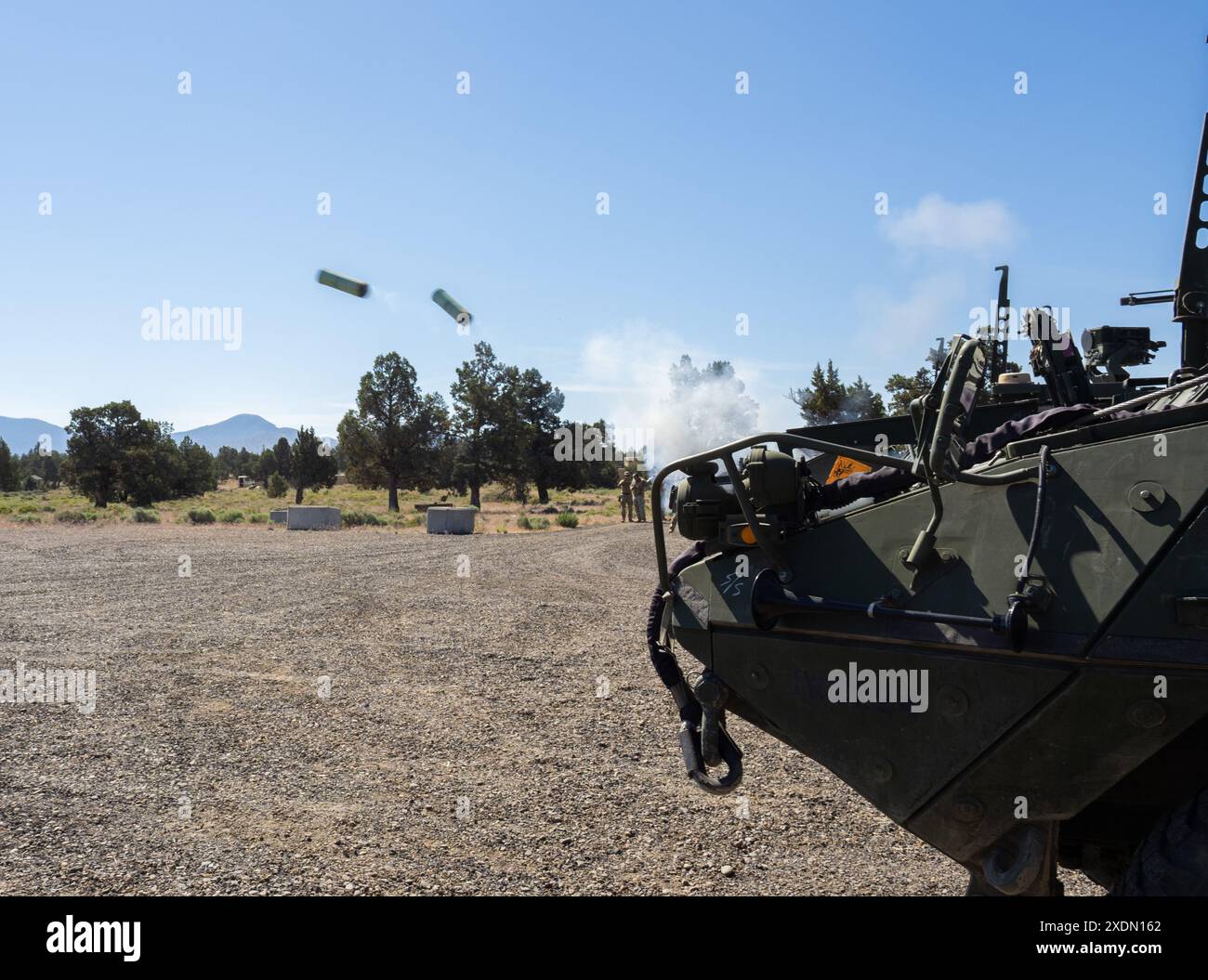 Charlie Troop crew fires off two M82 smoke grenades from their M1127 ...