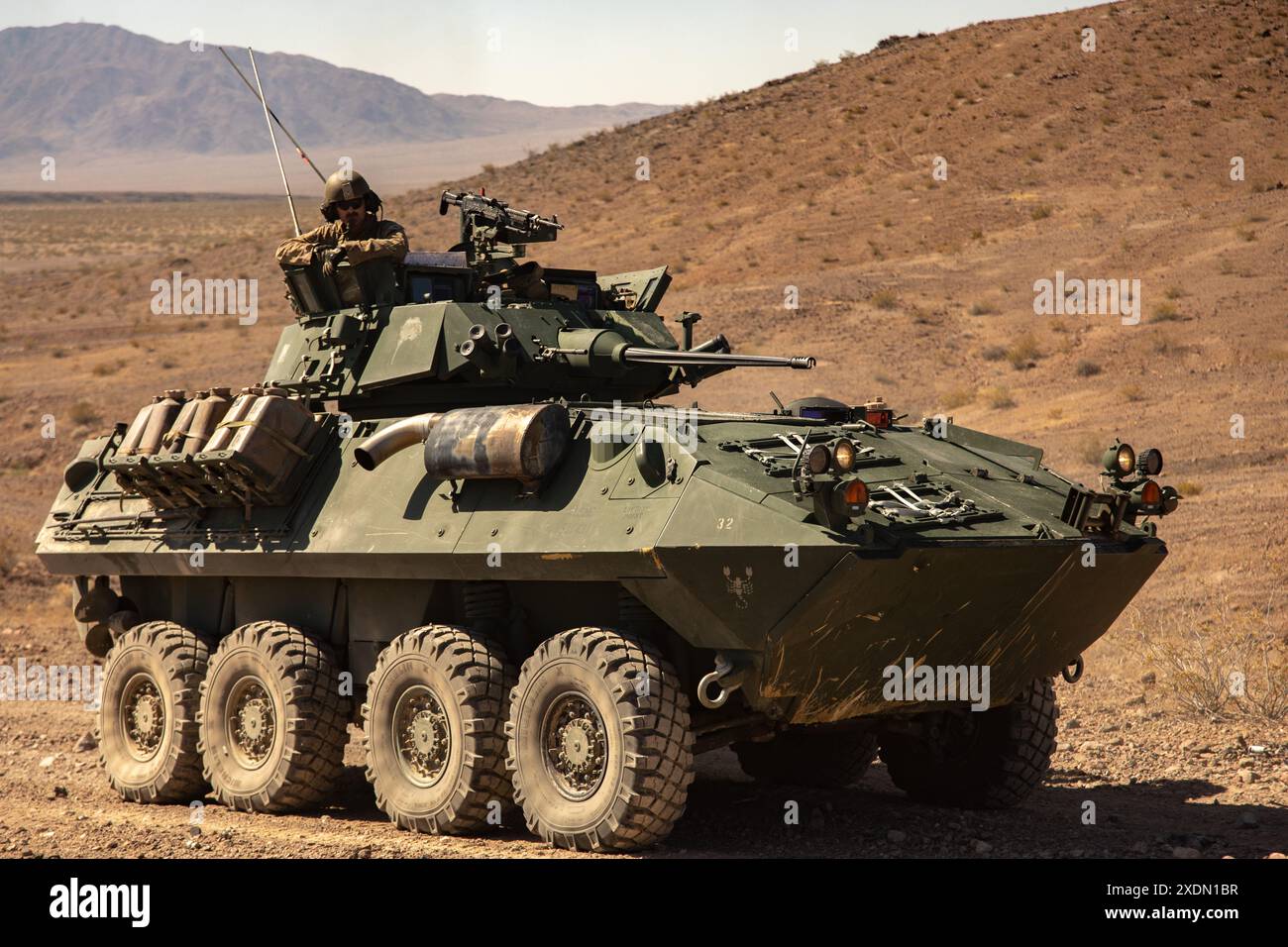 U.S. Marine Corps Capt. Matthew S. Johnson, platoon commander, Bravo Company, 4th Light Armored ...