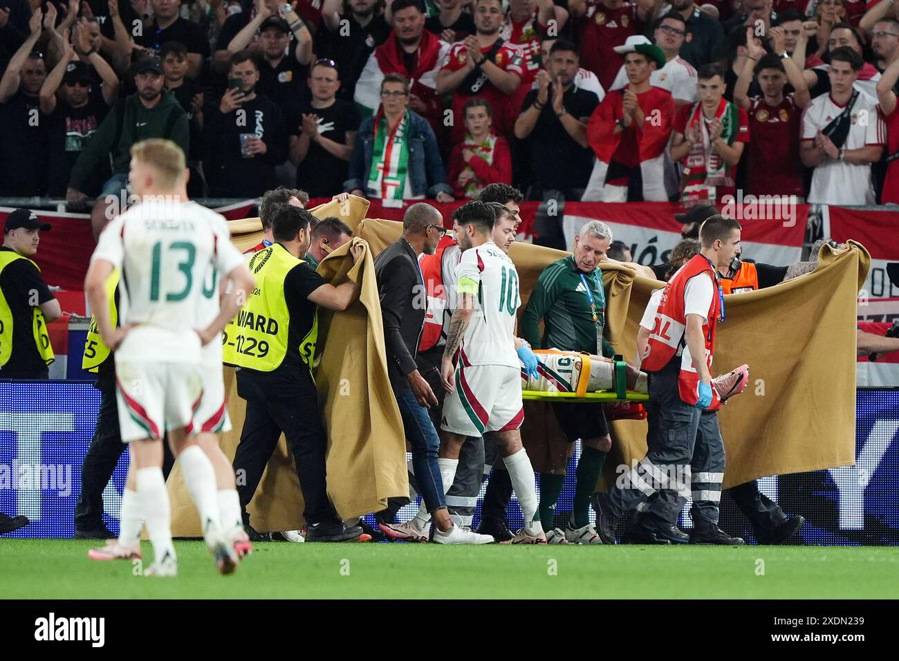 Hungary's Barnabas Varga leaves the pitch on a stretcher following a ...