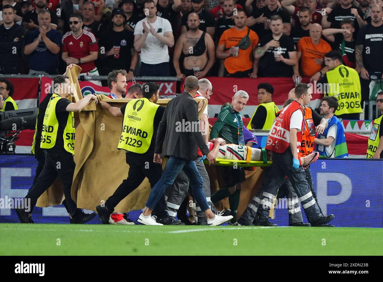 Hungary's Barnabas Varga leaves the pitch on a stretcher following a ...