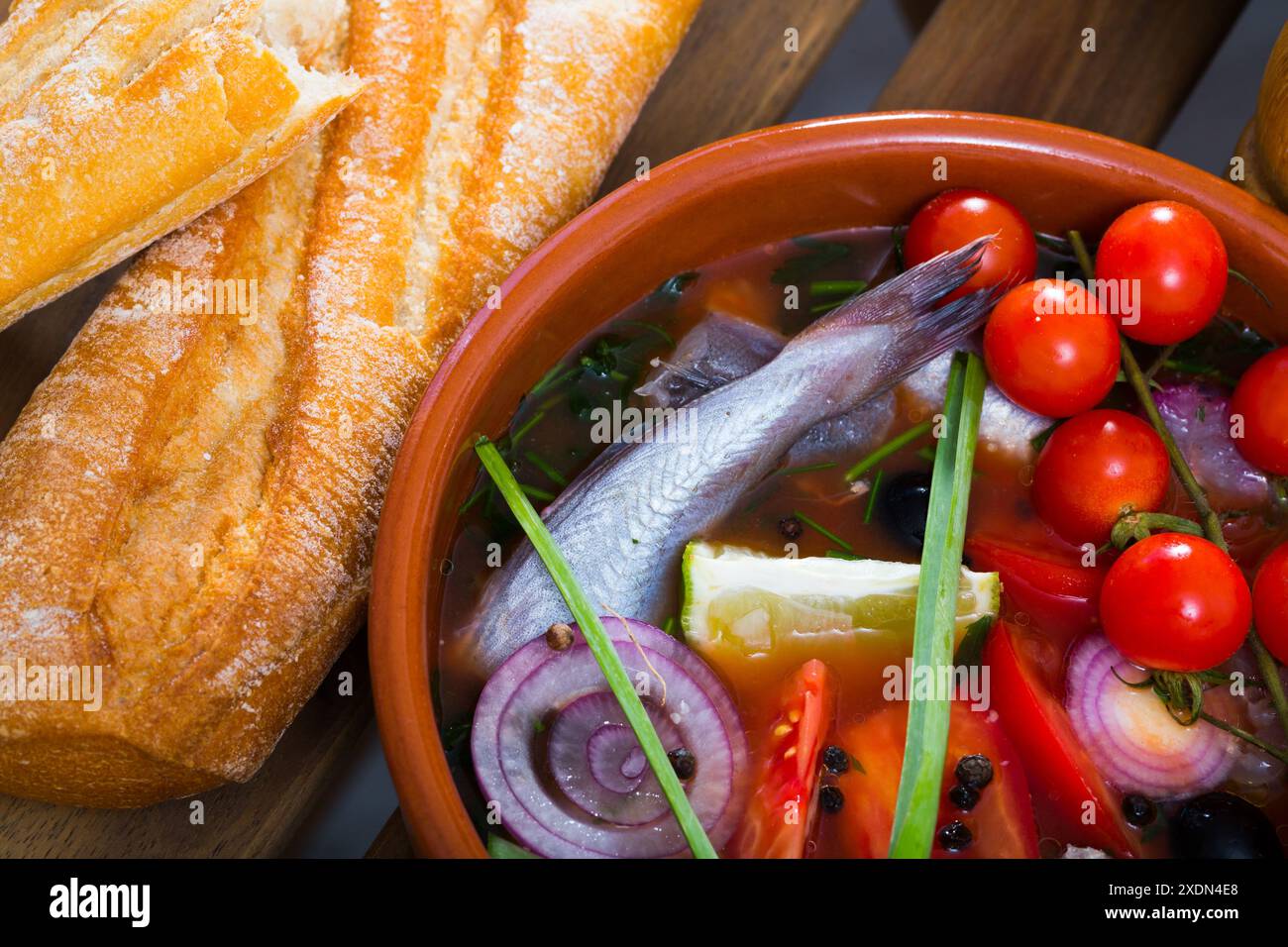 Fisherman's hoosh boiled with poutassou, small sea fish, tomatoes Stock ...