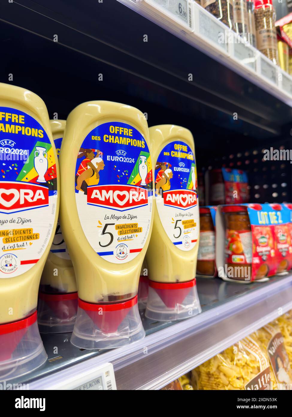 Paris, France - Apr 16, 2024: Amora French mustard for sale on a supermarket shelf, featuring ...