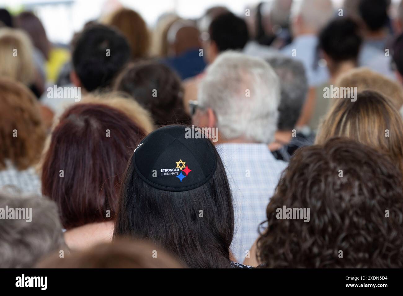 Members of the Jewish community attend the groundbreaking ceremony for ...