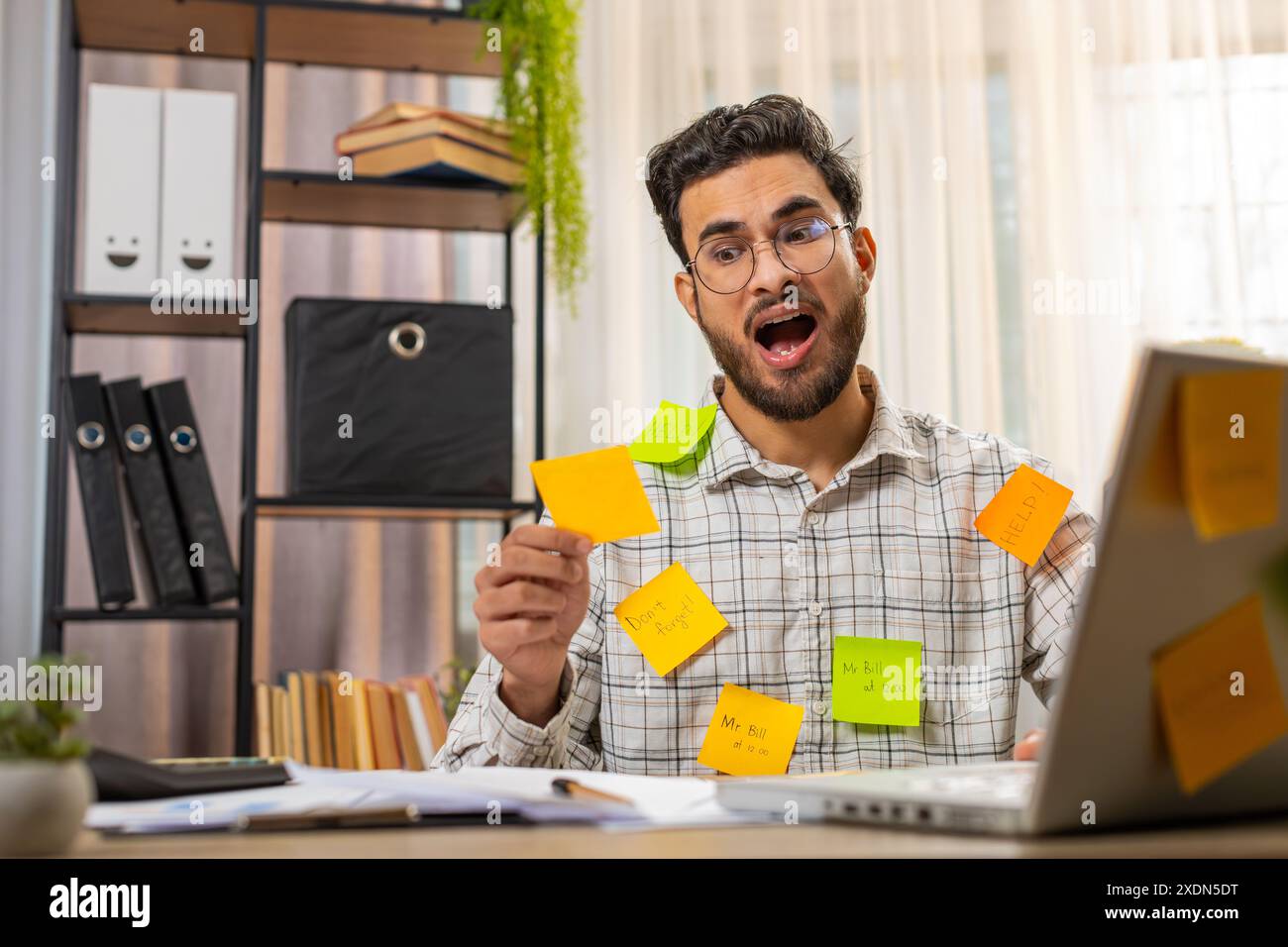 Tired exhausted fatigue young Arabian businessman office employee ...