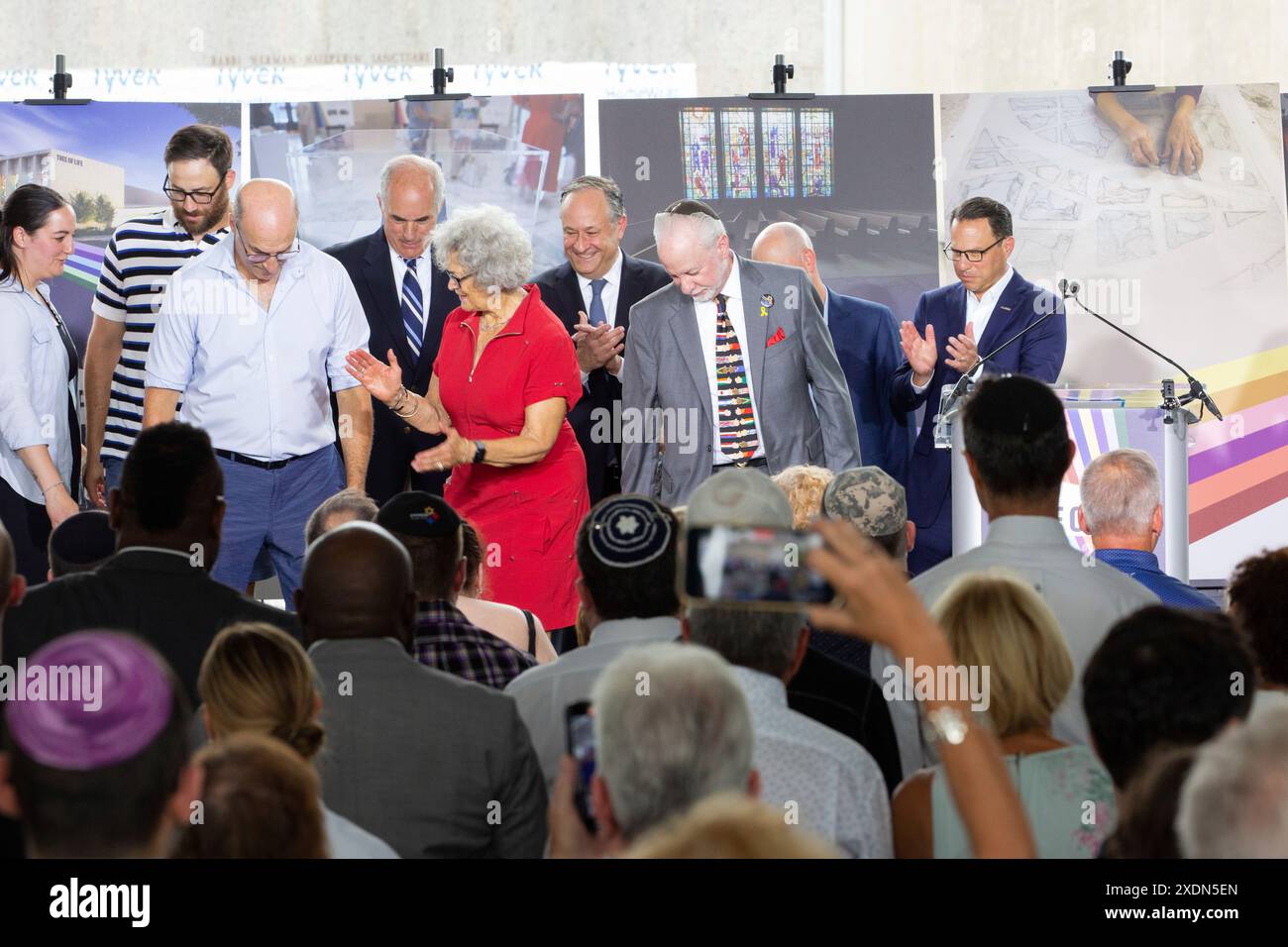 Survivors, family members and other dignitaries participate in breaking ...