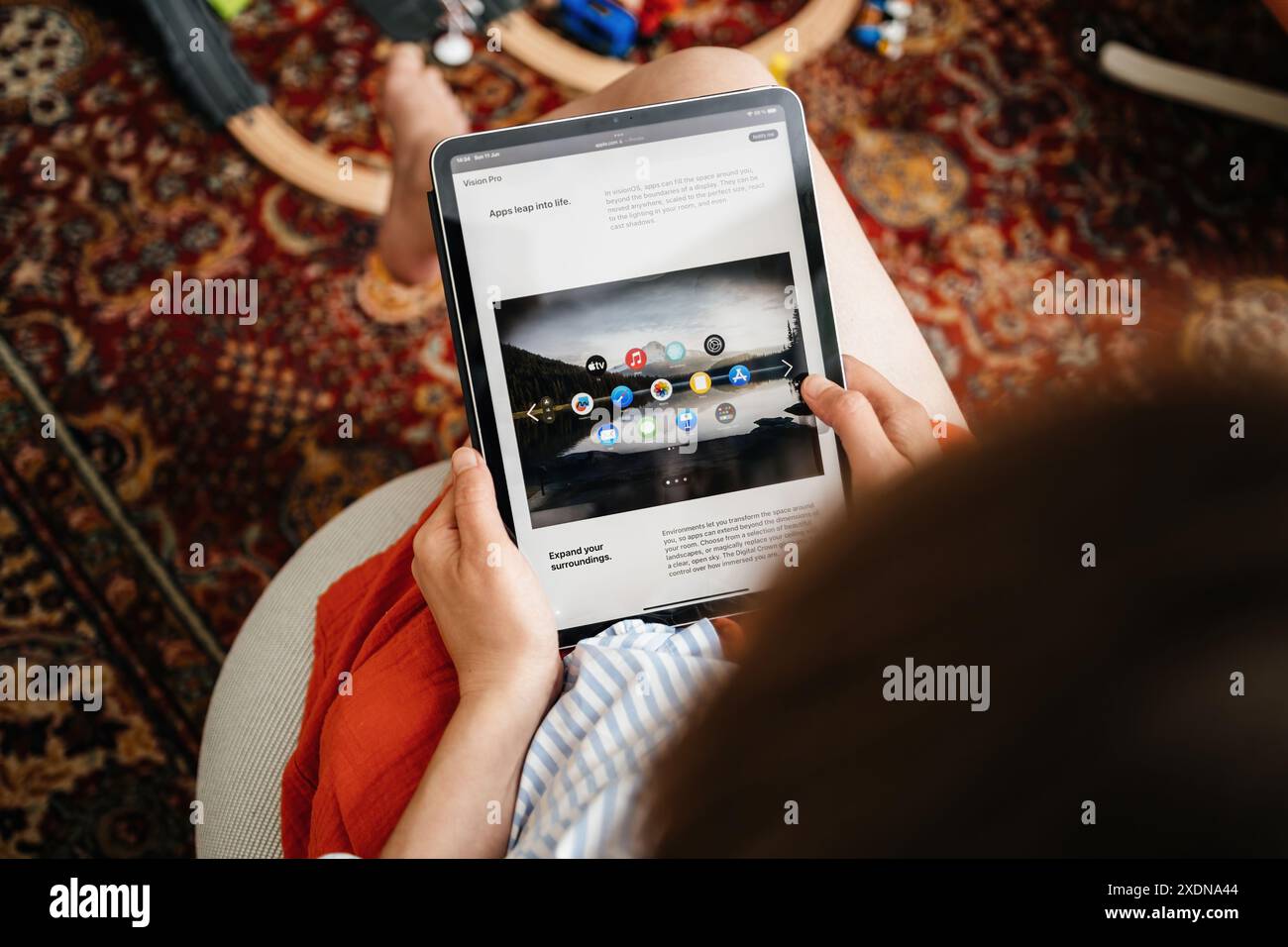London, United Kingdom - Jun 11, 2023: A woman holding and reading an ...