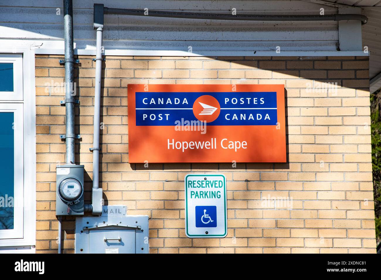 Post office and handicap parking signs at Hopewell Cape, New Brunswick ...