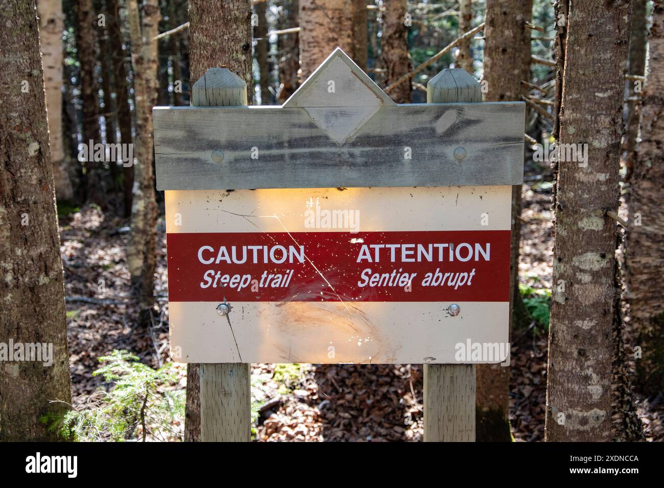 Safety warning sign of steep trail at Hopewell Rocks Provincial Park in ...