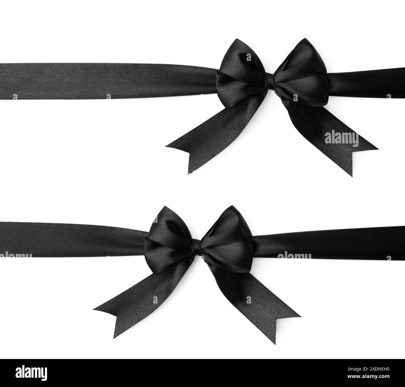Beautiful black satin bows isolated on white Stock Photo - Alamy