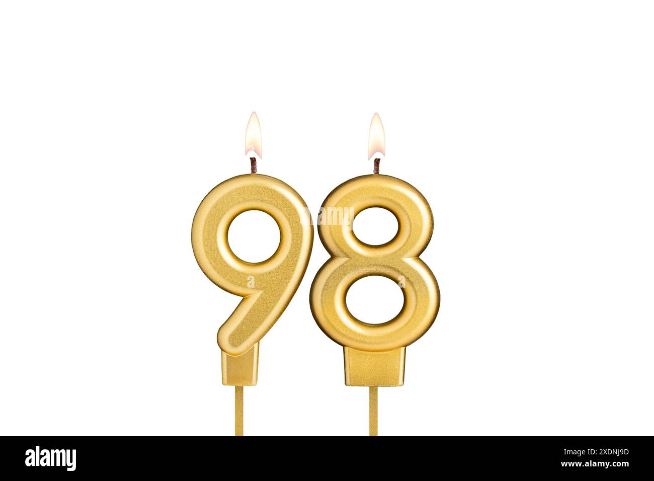 Golden number 98 birthday candle on white background Stock Photo - Alamy