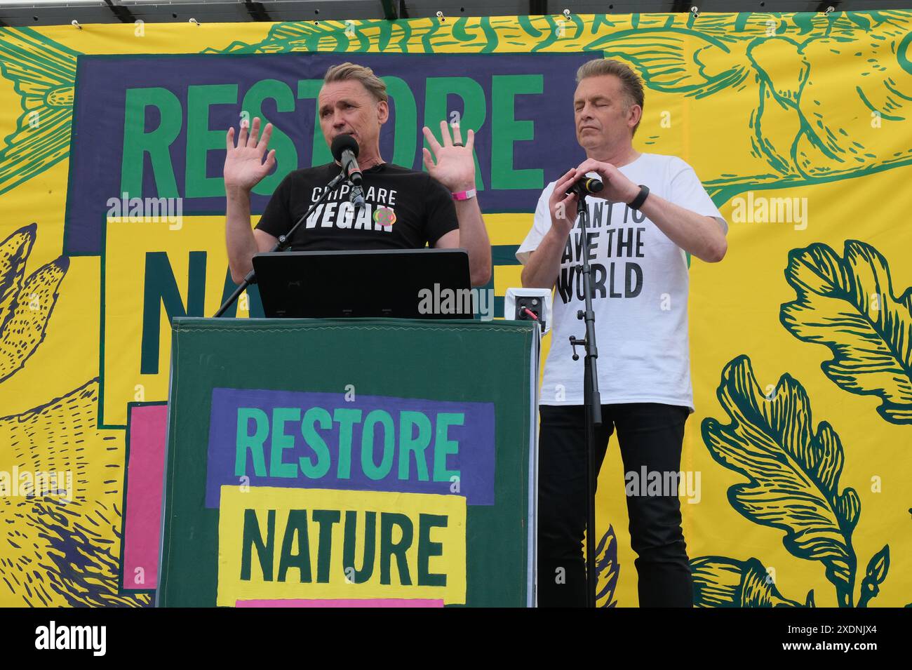 London, UK. Dale Vince and Chris Packham on stage at the Restore Nature ...