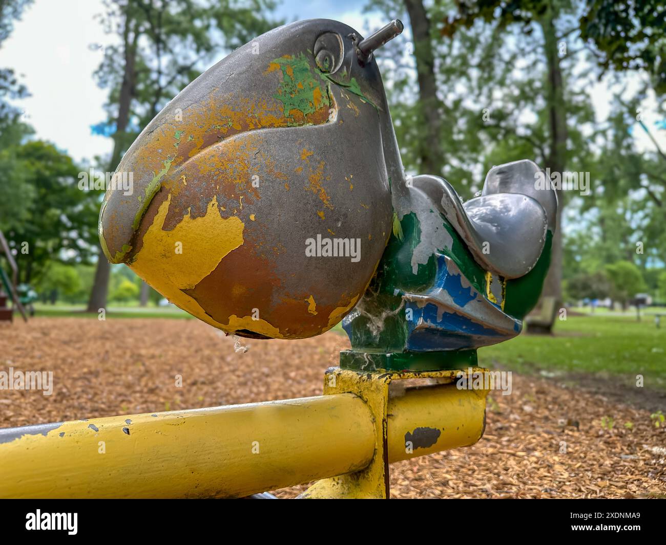Old, retro, used weathered metal park playground spring rocker, rocking ...