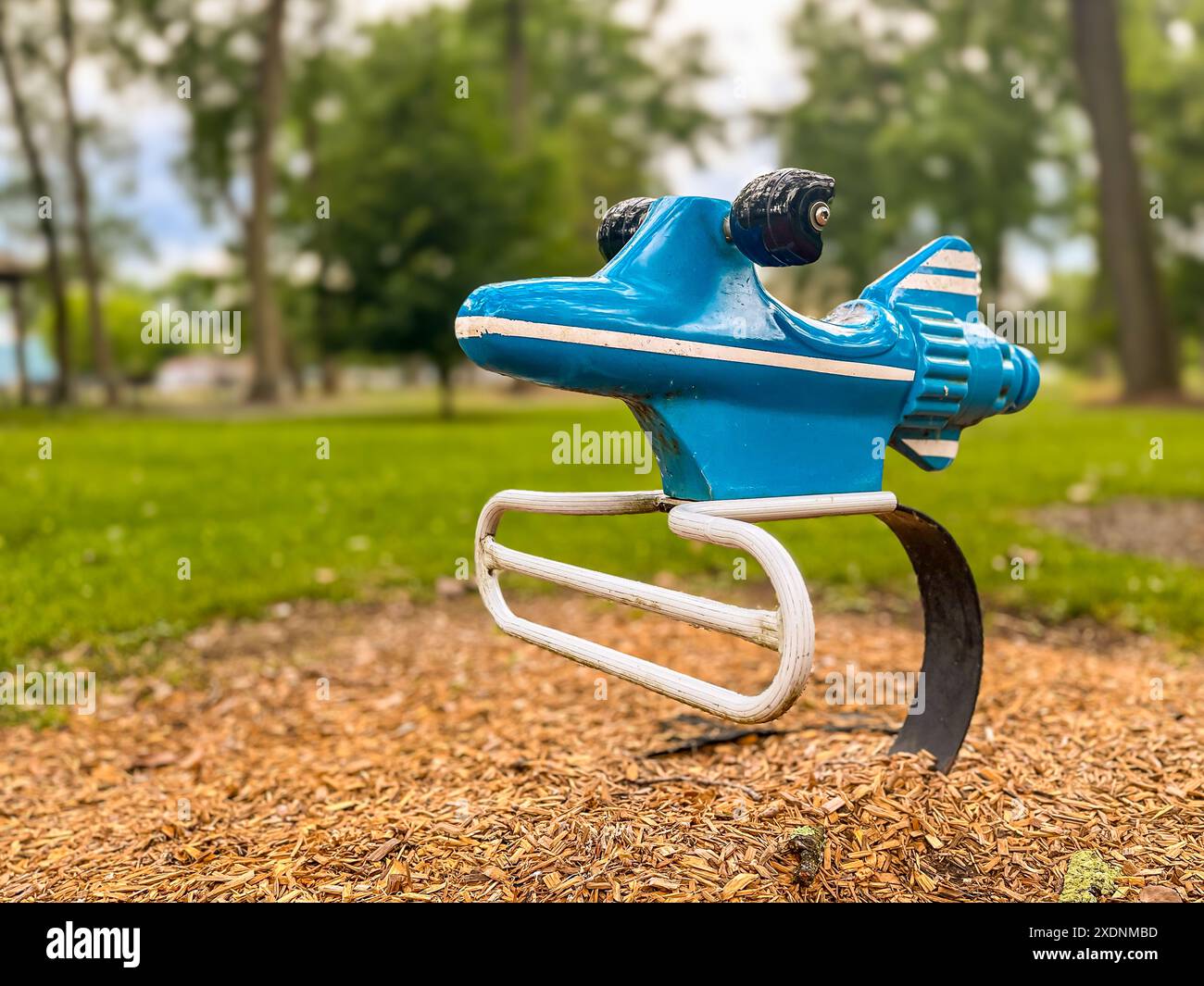 Old, retro, used weathered metal park playground spring rocker, rocking ...