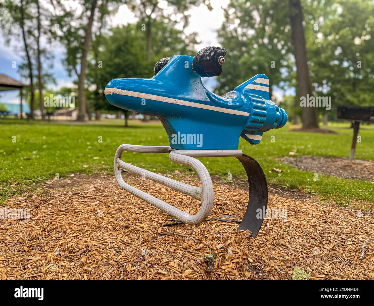 Old, retro, used weathered metal park playground spring rocker, rocking ...