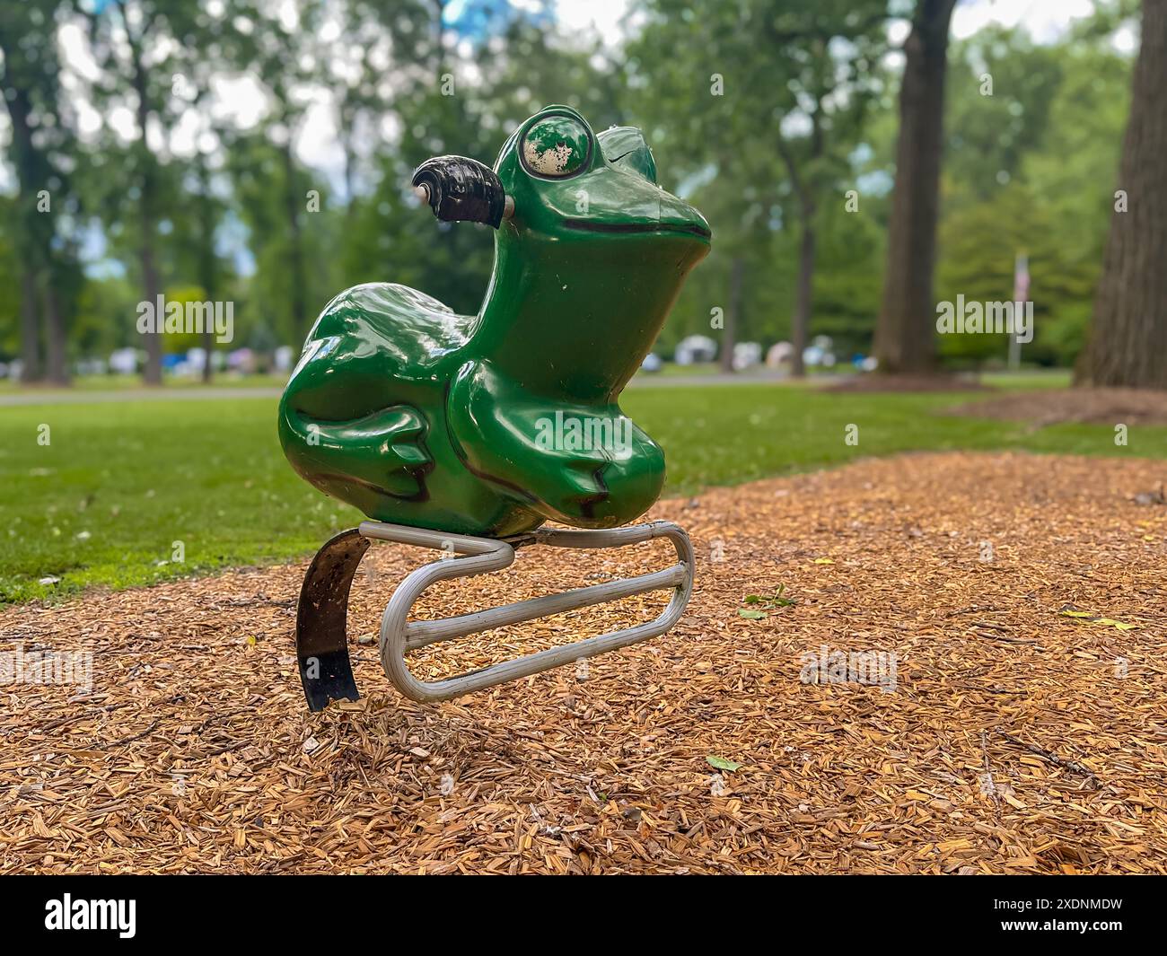 Old, retro, used weathered metal park playground spring rocker, rocking ...