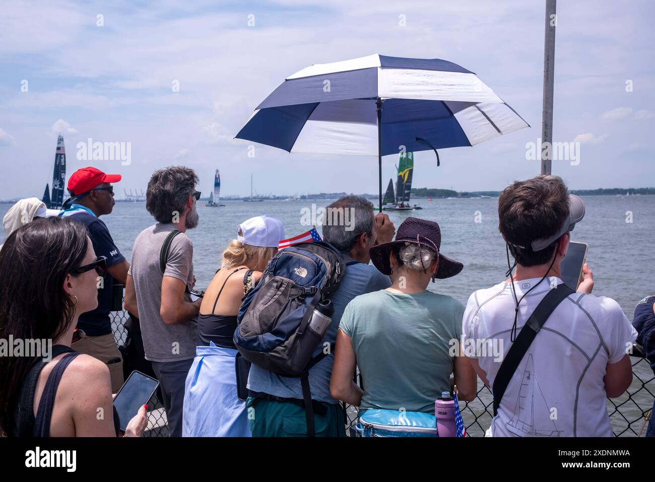 NEW YORK, NEW YORK - JUNE 23: Spectators watch SailGP boats race on Day ...