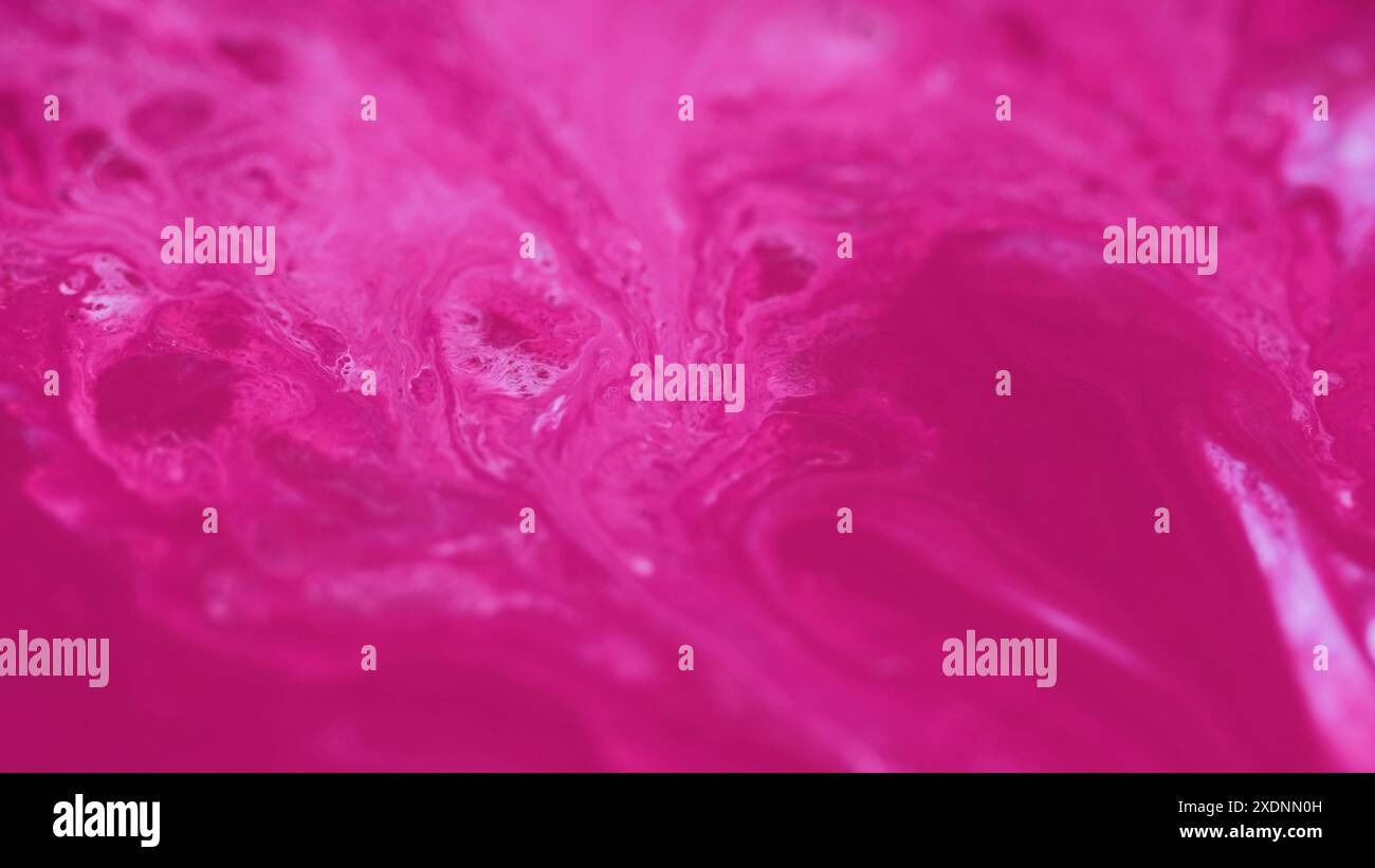 Paint splash. Water dye flow. Defocused pink white color pigment powder ...