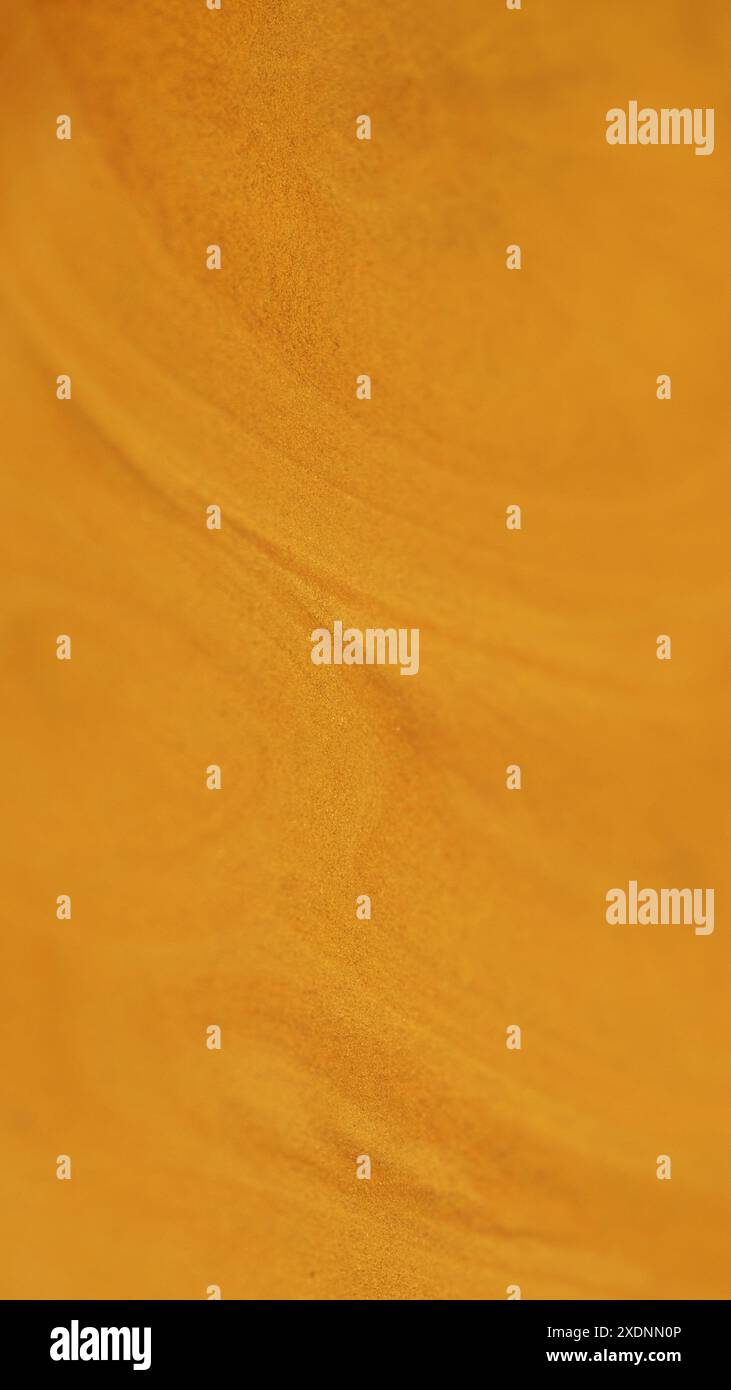 Shimmer fluid spill. Glitter paint texture. Blur orange golden color ...