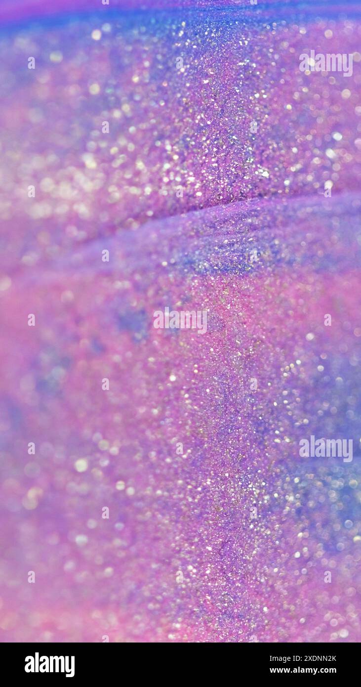 Particles flow liquid shimmer defocused hi-res stock photography and ...