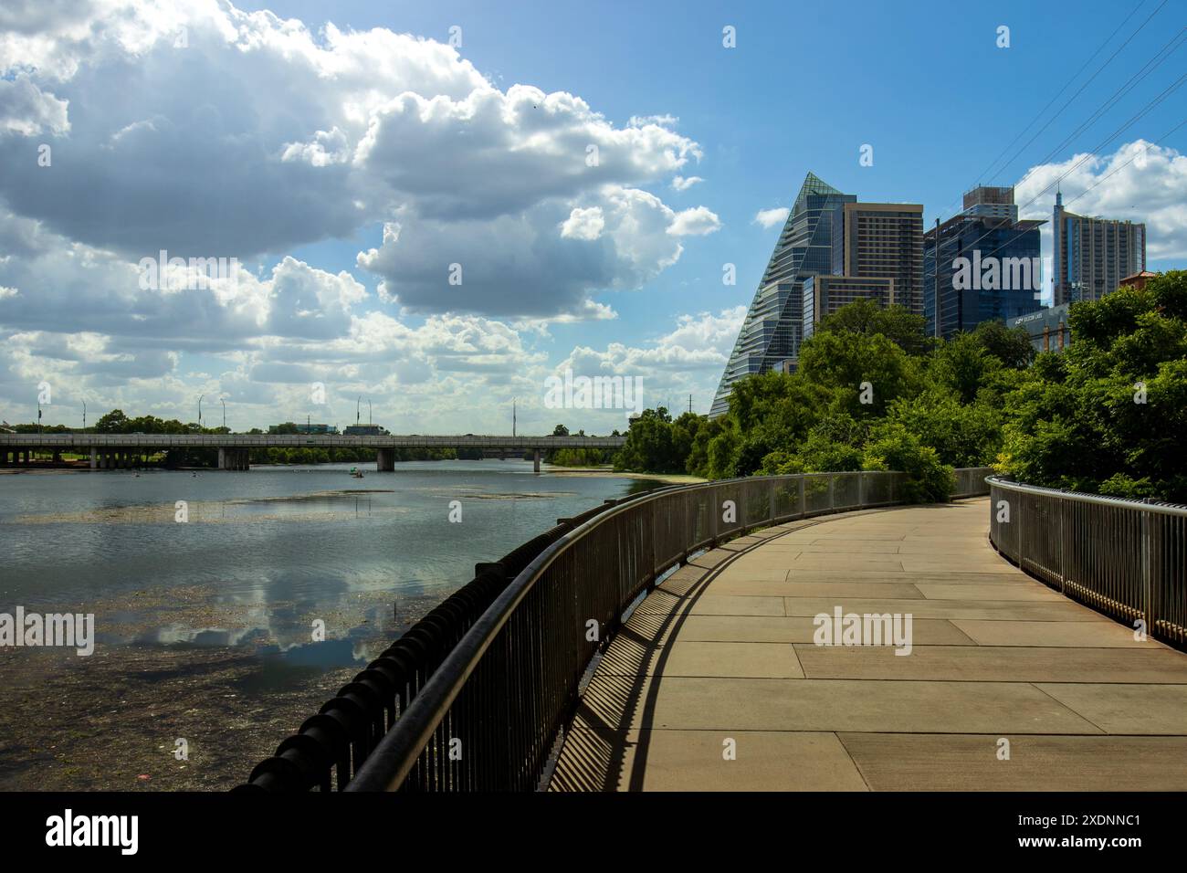 Explore the beautiful riverside walkway that curves along the edge of ...