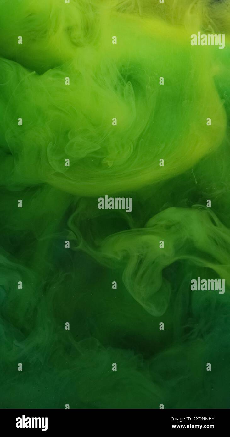Glitter vapor cloud. Ink splash water. Defocused neon green color ...
